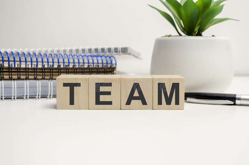 Team Word Concept Written on Wooden Blocks, Cubes on a Light Table ...
