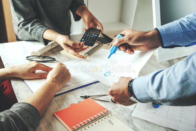 Team work in documents stock image. Image of business - 196469941