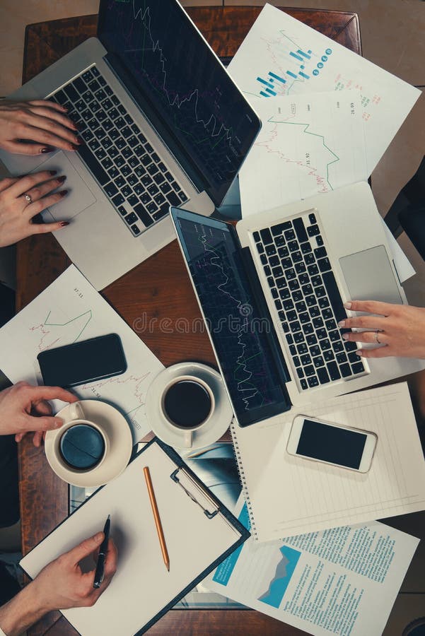 Team work on his workplace stock image. Image of paper - 138300939