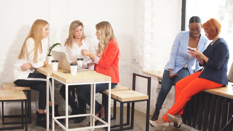 Team Work Process. Multiracial Group of Women Coloborating in Open ...