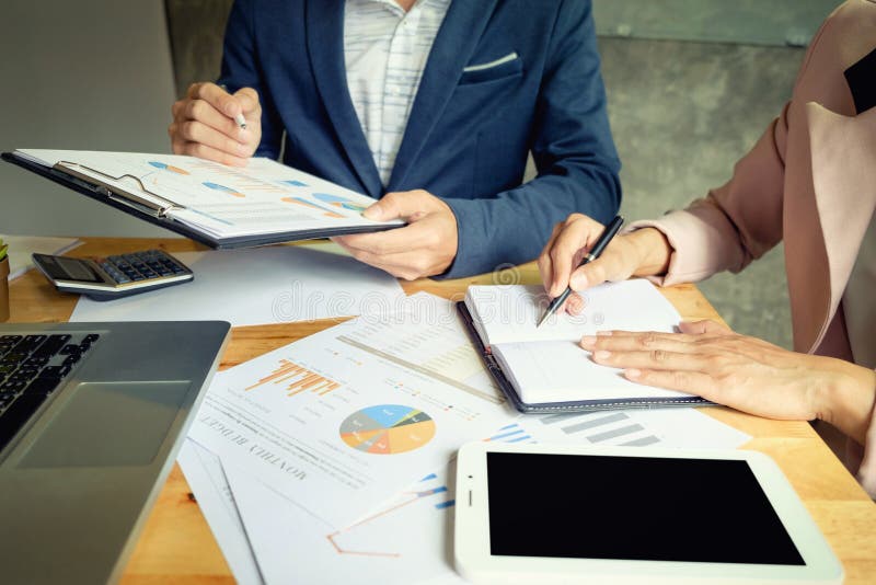 Team Work Process. Young Business Managers Crew Working with New Stock ...