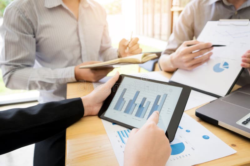 Team Work Process. Young Business Managers Crew Working with New Stock ...