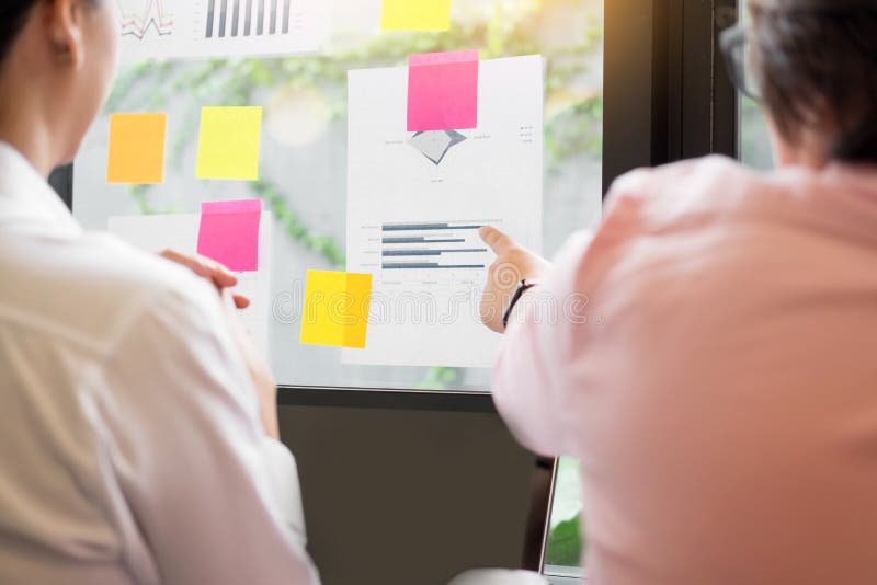 Team Work Process. Young Business Managers Working with Startup Stock ...