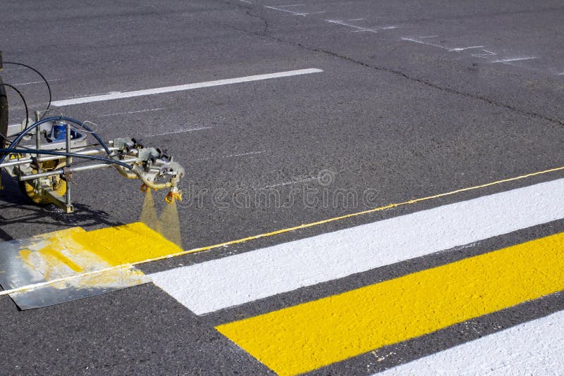 Road Workers Use Hot-melt Scribing Machines To Painting Pedestrian ...
