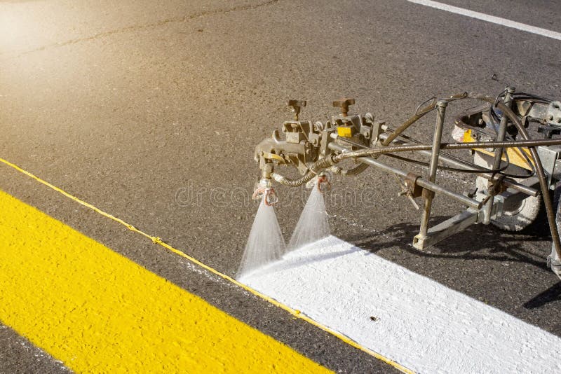 Road Workers Use Hot-melt Scribing Machines To Painting Pedestrian ...