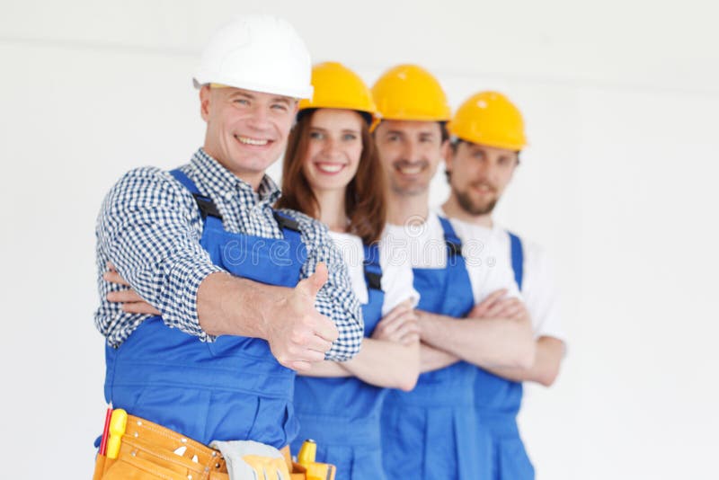 Team of workers stock image. Image of helmet, worker - 66579899