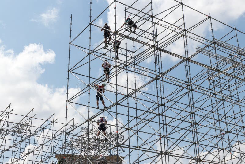 Workers Assembling a Metallic Structure Editorial Photography - Image ...