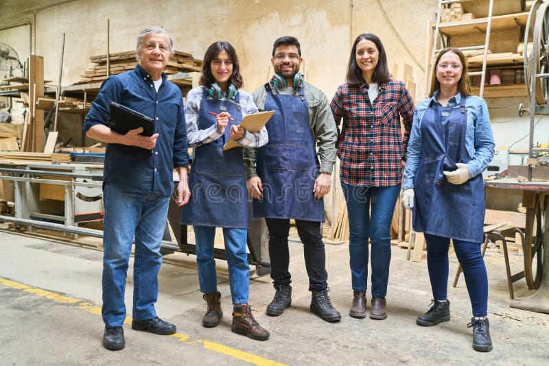 Team of Workers in a Lumberyard Showcasing Teamwork and Skills Stock ...