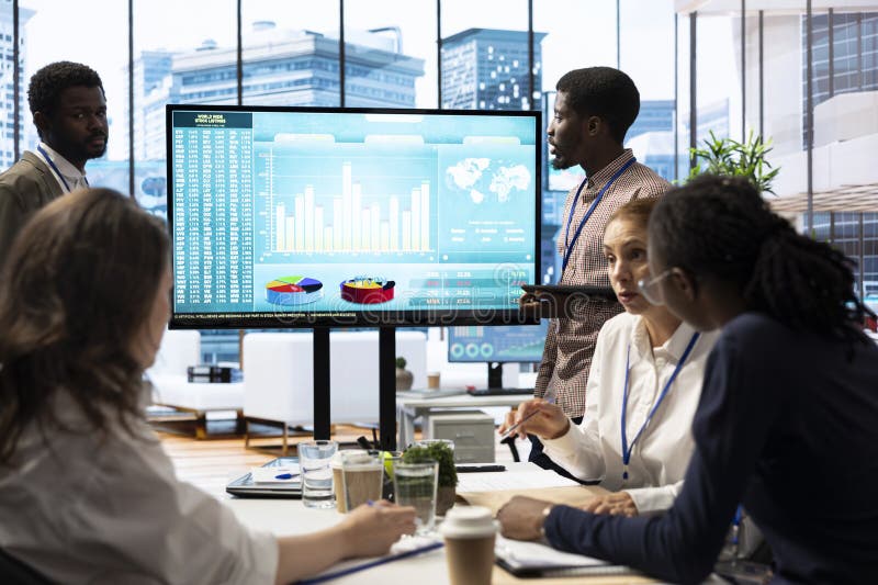 Team Workers Presenting Infographics Sales Numbers Interactive Board ...