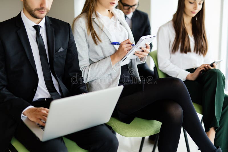 Team Working at Conference Sitting on Chair and Make Notice. Stock ...