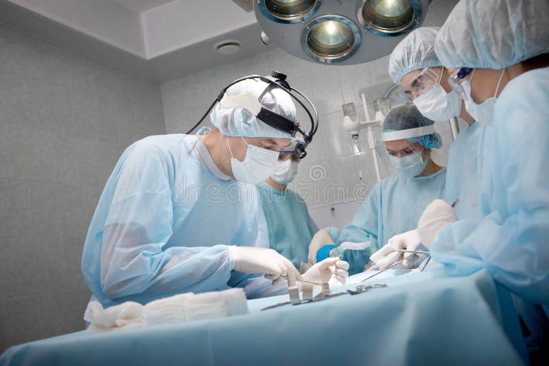 Surgeons operating stock photo. Image of health, holding - 16434744