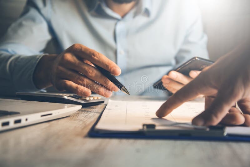 Team Working in Document on Desk Stock Photo - Image of team, document ...