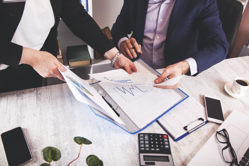 Team working in document stock photo. Image of team - 140583598