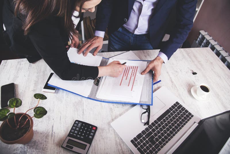 Team working in document stock image. Image of teamwork - 140461001