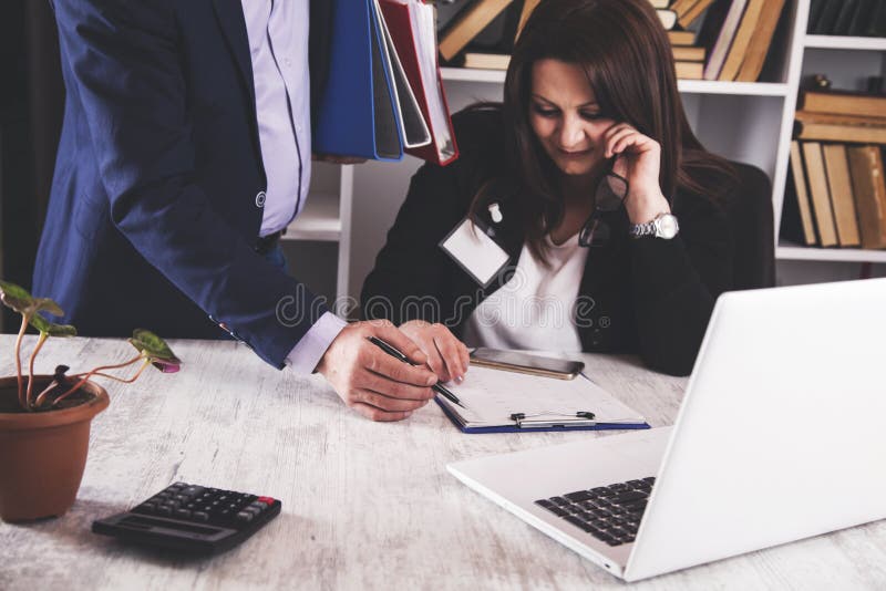 Team working in document stock photo. Image of discussion - 140583420