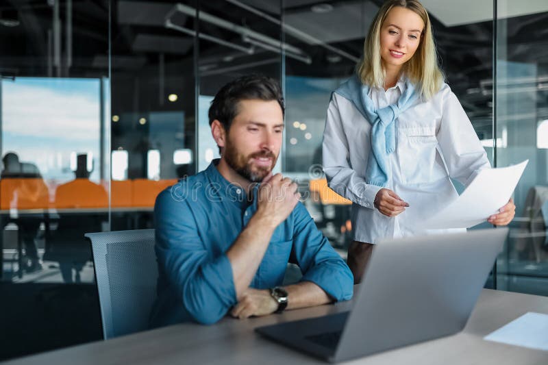 Team Working on Project Materials and Looking Excited Stock Image ...