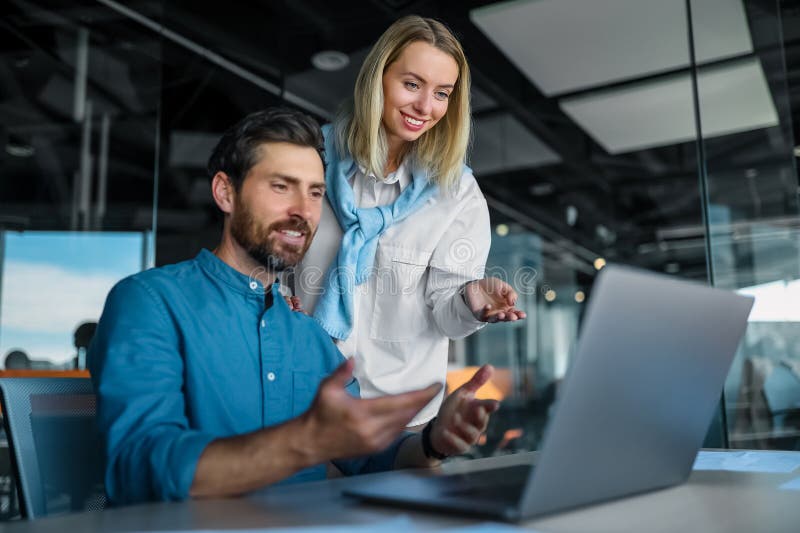 Team Working on Project Materials and Looking Excited Stock Photo ...