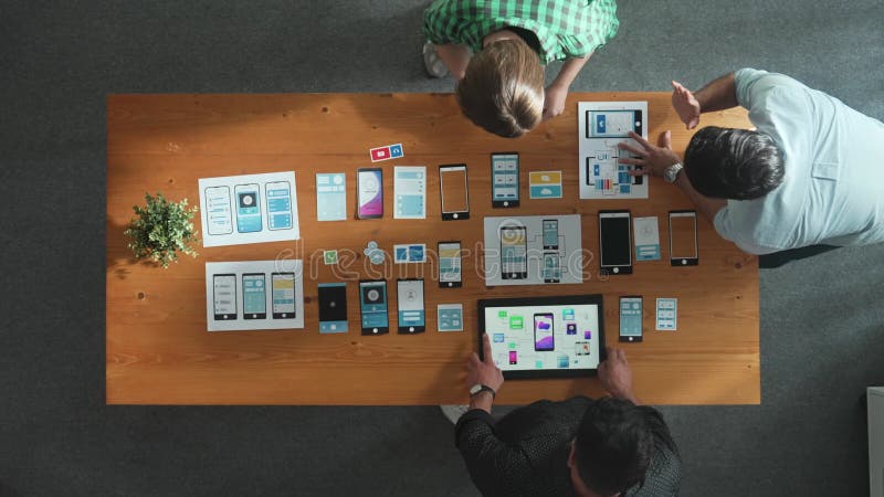 Team Working on Ux Ui Design while Manager Walk at Meeting Table ...