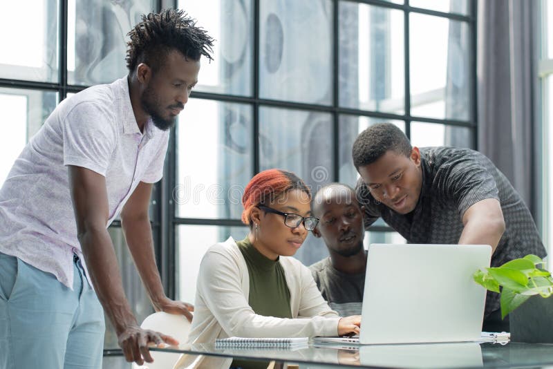Team of Young African People in the Office Working on Laptop Stock ...