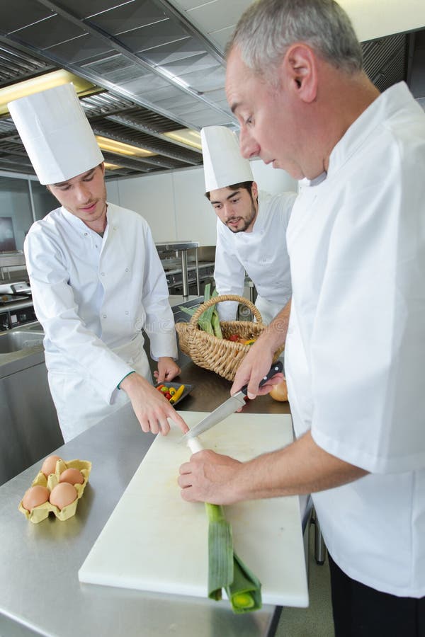 Team Young Apprentice Chefs Preparing Delicatessen Dishes Stock Photo ...