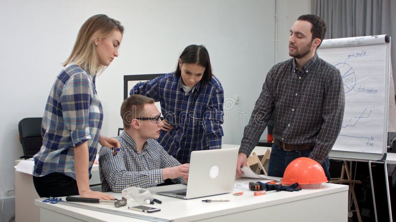 Team of Young Architects Preparing To Start New Project Stock Photo ...