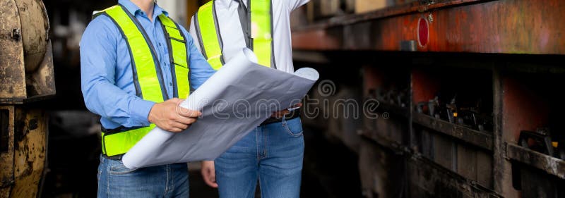 Team Young Caucasian Engineer Man Checking Train Looking Blueprint in ...