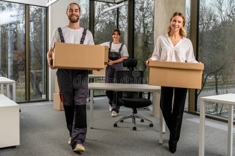 Team of Young Colleagues Working in a Packaging Office Stock Image ...
