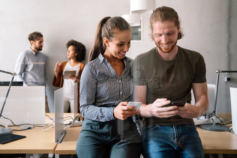 Team of Young Creative Marketing Experts Brainstorming during Work ...