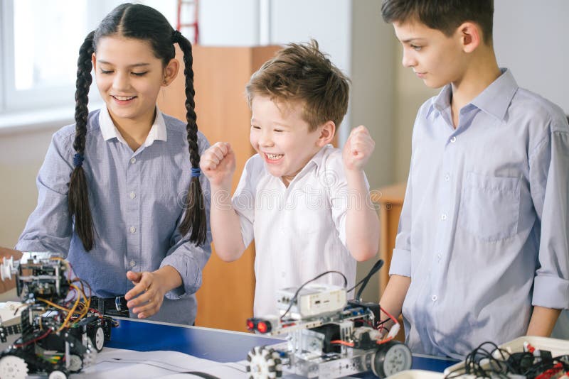 Robotics For Kids. Happy Children Building Robots Stock Image - Image ...