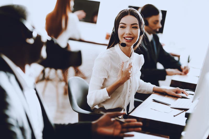 Team of Young Managers Working in Call Center. Manager with Computer ...