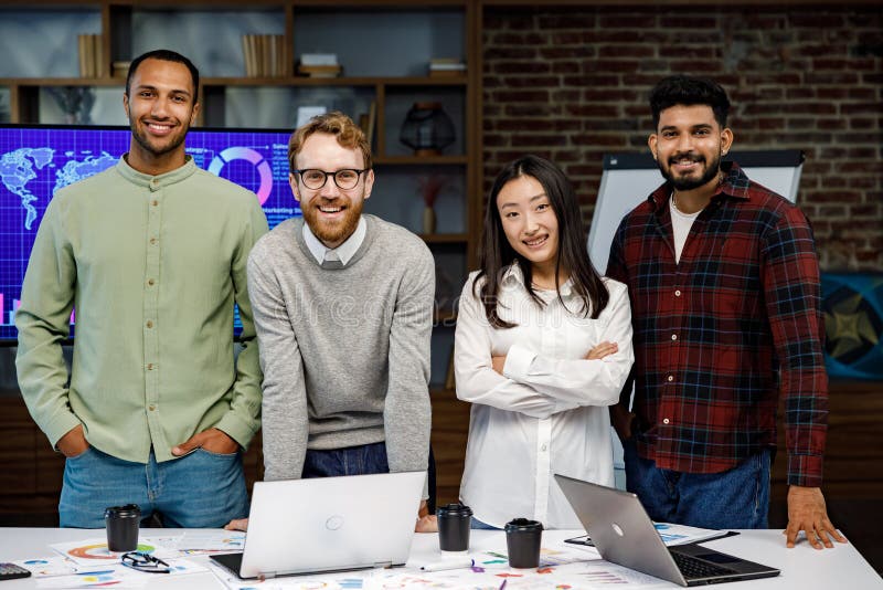 A Team of Young Multinational Business People are Working on a Startup ...