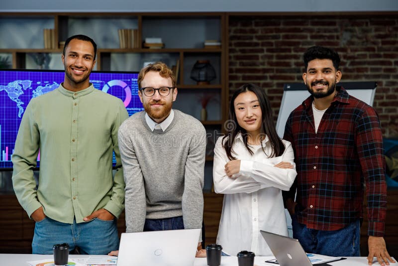 A Team of Young Multinational Business People are Working on a Startup ...