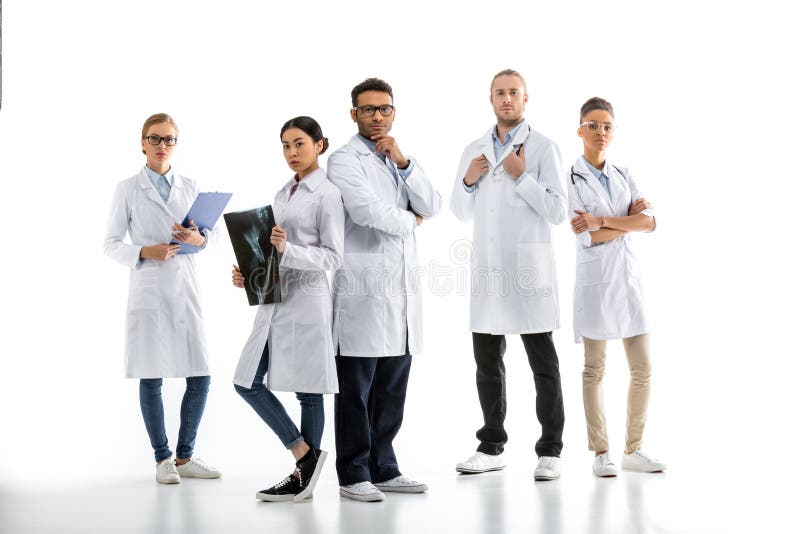 Team of Young Professional Doctors Standing Together Stock Photo ...