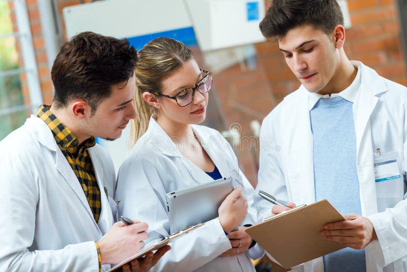 Scientists Working in Laboratory Stock Image - Image of liquid, person ...