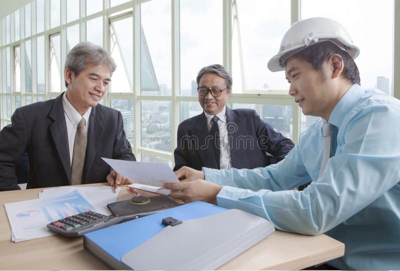 Team of Young and Senior Engineering Man Project Meeting in Work Stock ...