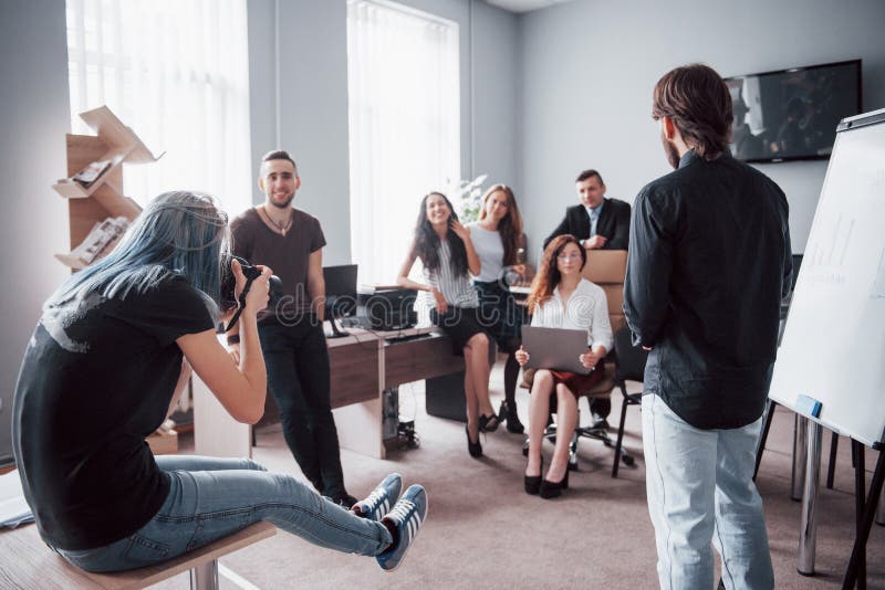 A Team of Young Students in the Office are Photographed. Stock Photo ...
