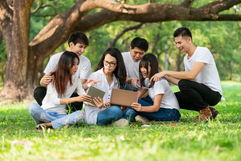 Team of Young Students Studying in the Park. Stock Photo - Image of ...