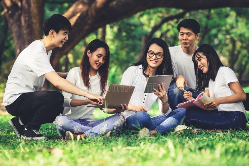 Team of Young Students Studying in the Park. Stock Photo - Image of ...