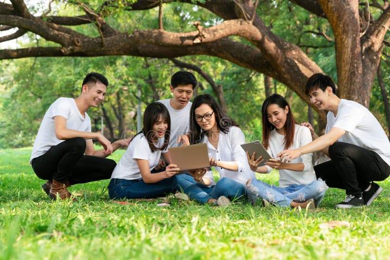 Team of Young Students Studying in the Park. Stock Image - Image of ...