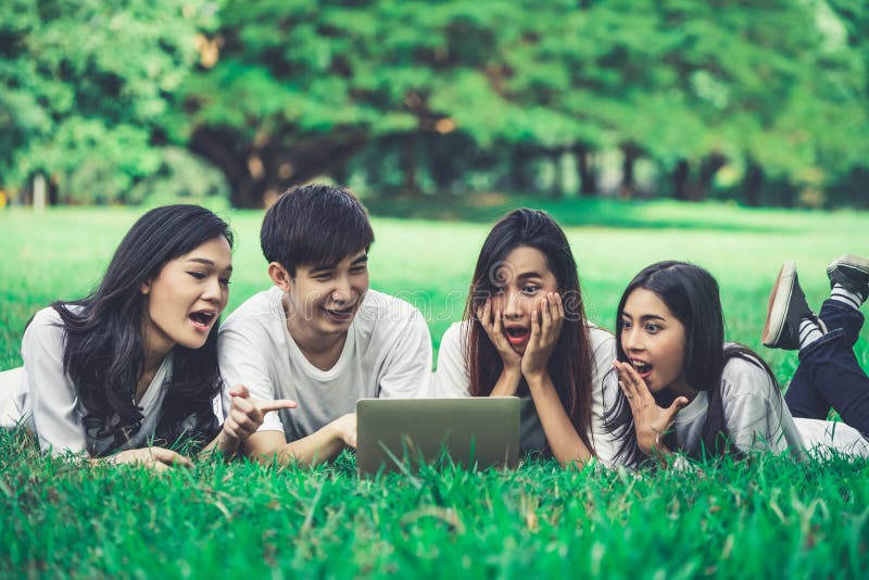 Team of Young Students Studying in the Park. Stock Image - Image of ...