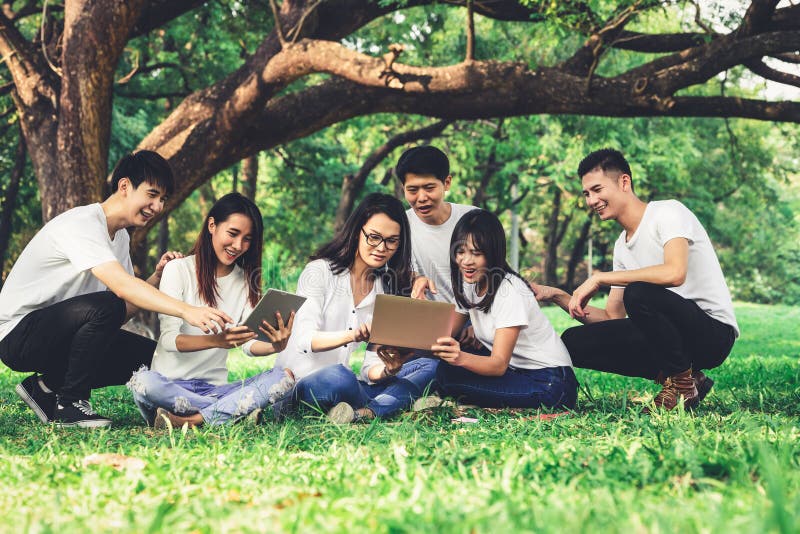 Team of Young Students Studying in the Park. Stock Image - Image of ...