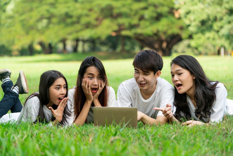 Team of Young Students Studying in the Park. Stock Image - Image of ...