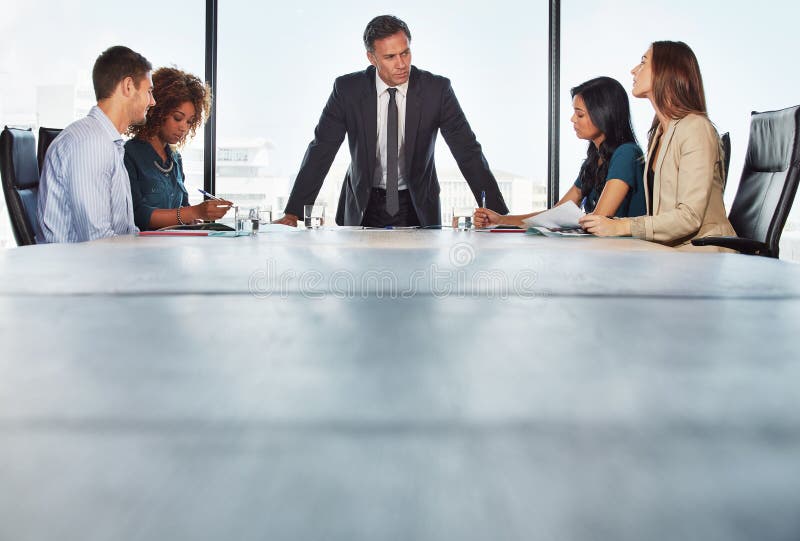 The Teams Talking Strategy. a Group of Businesspeople in a Meeting ...