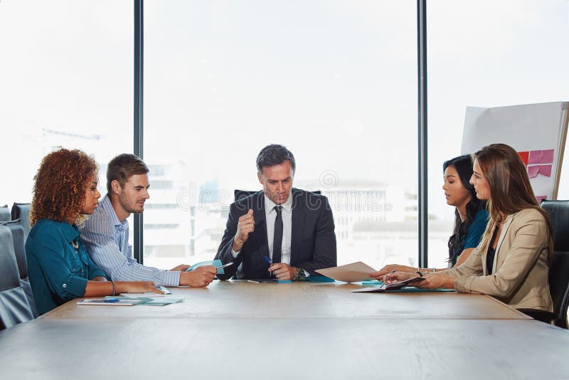 The Teams Talking Strategy. a Group of Businesspeople in a Meeting ...