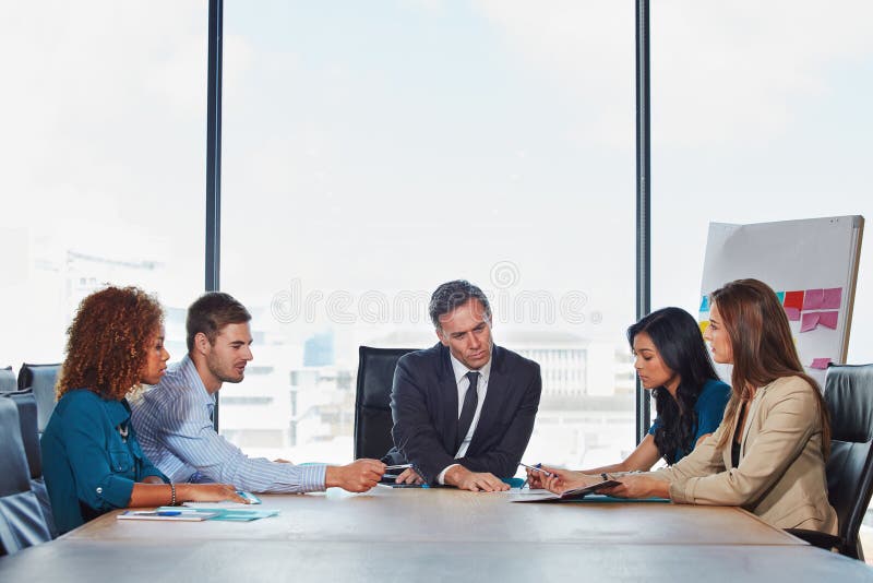 The Teams Talking Strategy. a Group of Businesspeople in a Meeting ...