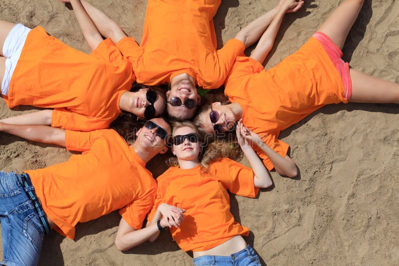 Teamstern stockbild. Bild von freunde, sand, mann, feiertage - 10568189