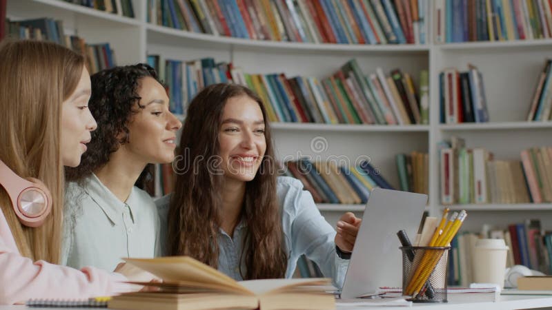 Teamwork in Action: Happy Ladies Students Bonding and Sharing Knowledge ...