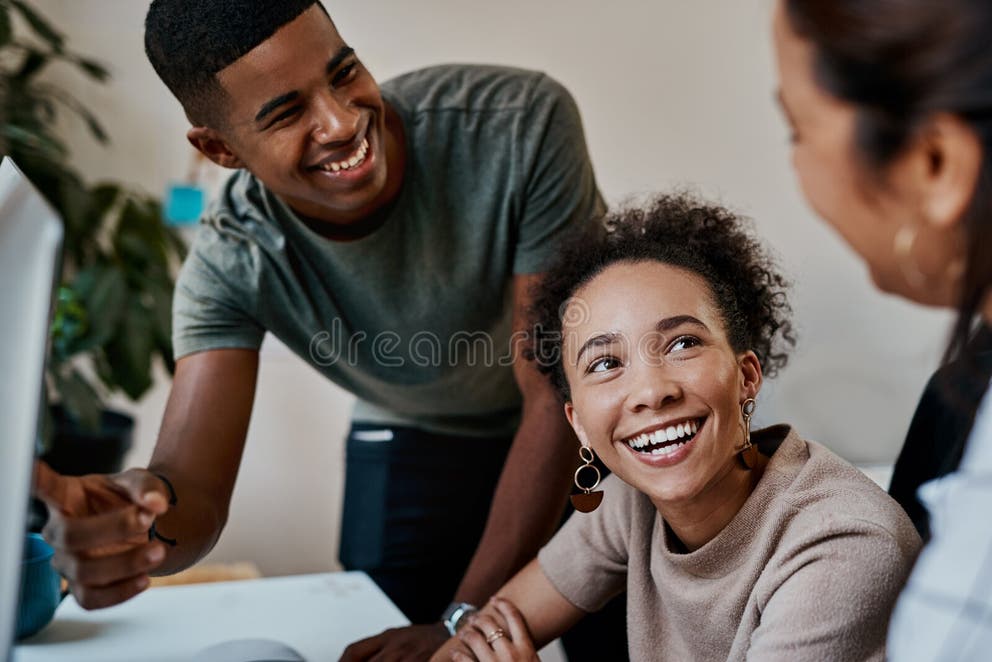 With Teamwork Anything is Possible. a Group of Young Businesspeople ...