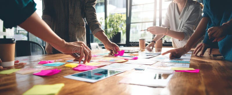 The Teamwork Approach of Professionals Collaborating Around a Table ...