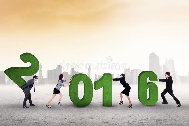 Teamwork Arrange Numbers 2016 Stock Photo - Image of attractive, male ...